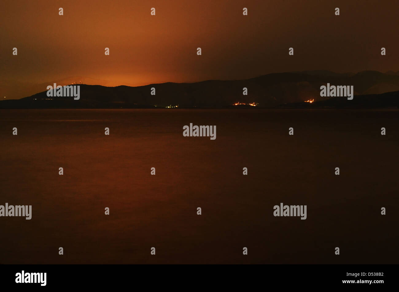A night time seascape Stock Photo - Alamy