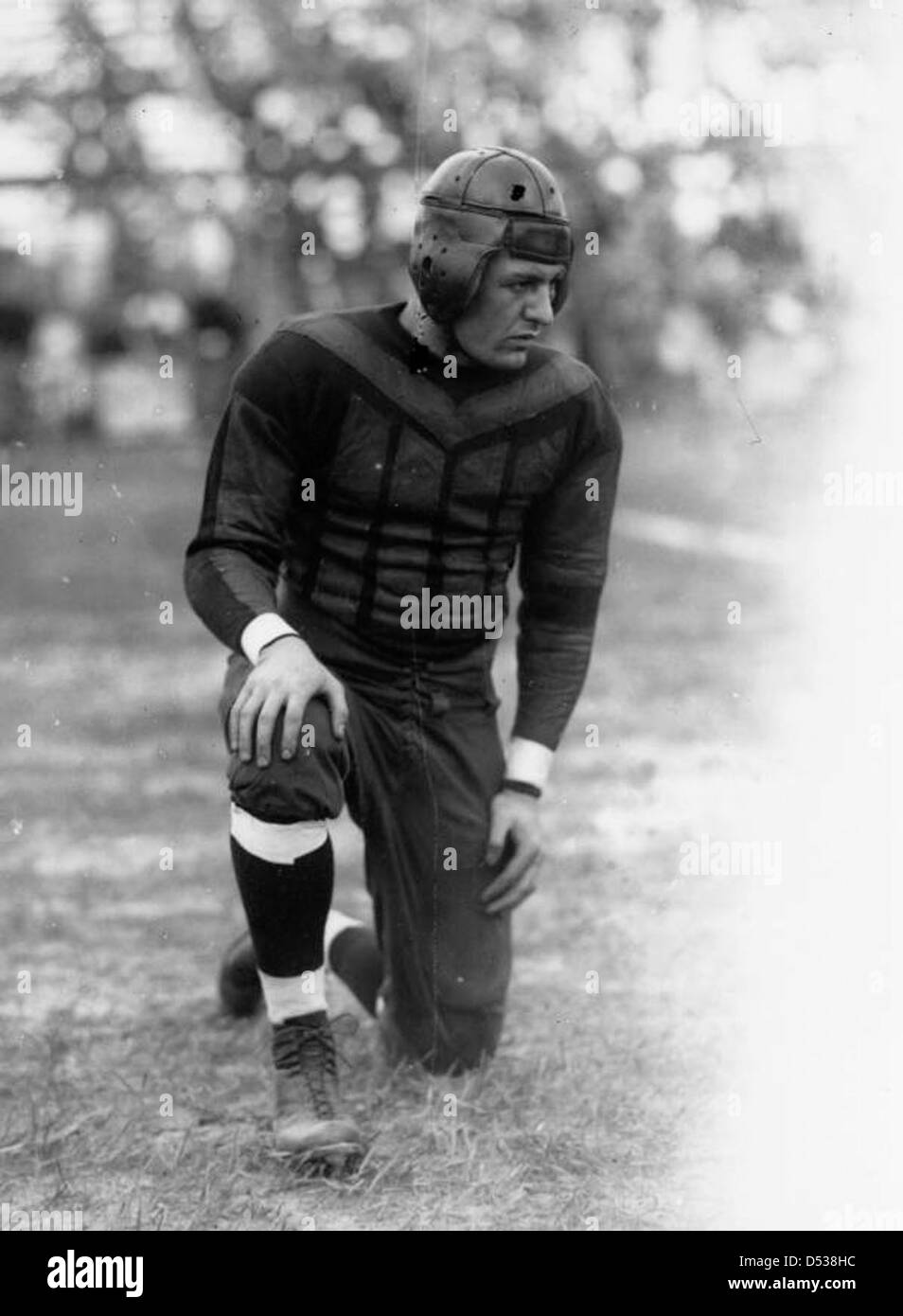 A University of Miami football player is captured in uniform during a ...