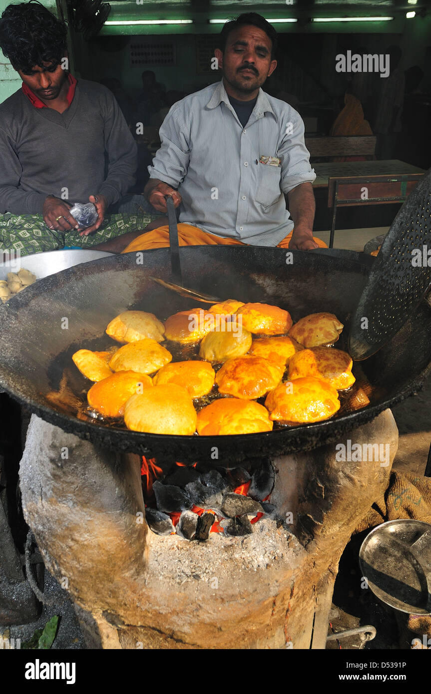 Man frying typical Indian food Purry Stock Photo - Alamy