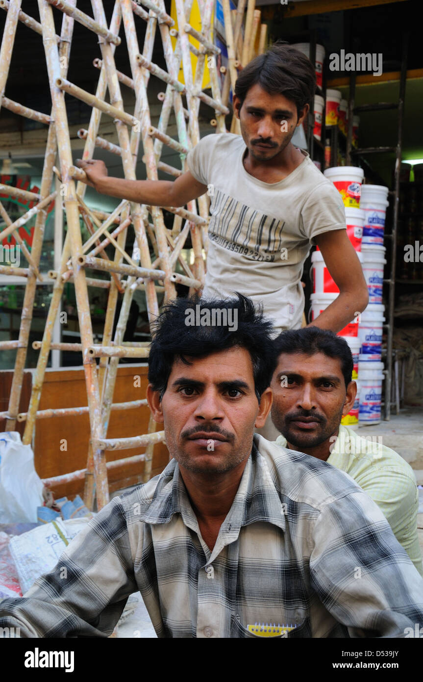 Paint workers waiting on the street outside of the paint shop Stock ...