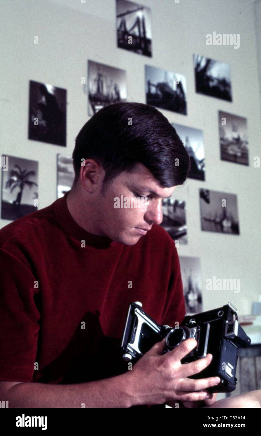 Sergeant 2nd Class Dale M. McDonald, base photographer, in his barracks ...