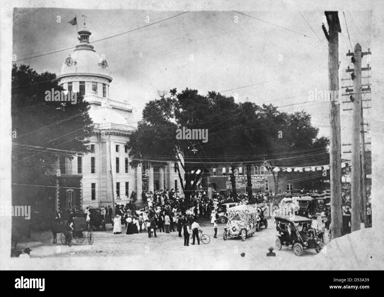 A parade celebrates the completion of the Old Polk County Courthouse in ...