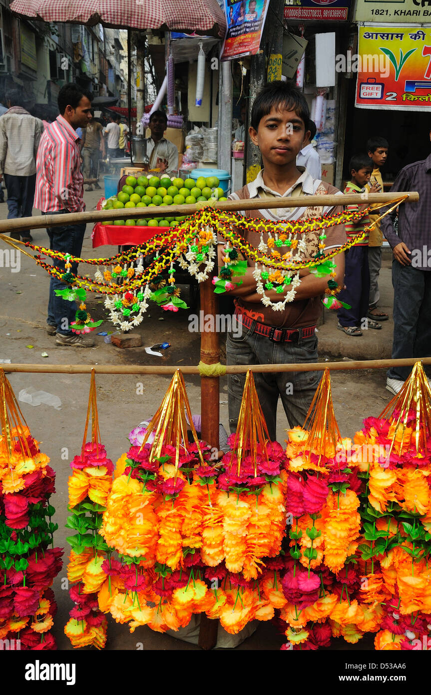 Boy selling artificial flower for Diwali festival Stock Photo - Alamy