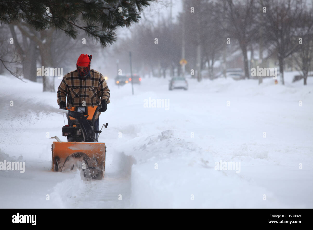 Man with snow blower after a heavy snowstorm in Kitchener, Ontario ...