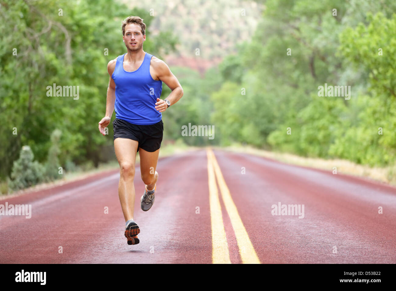 Athletic fit young Caucasian sport fitness male runner training for ...