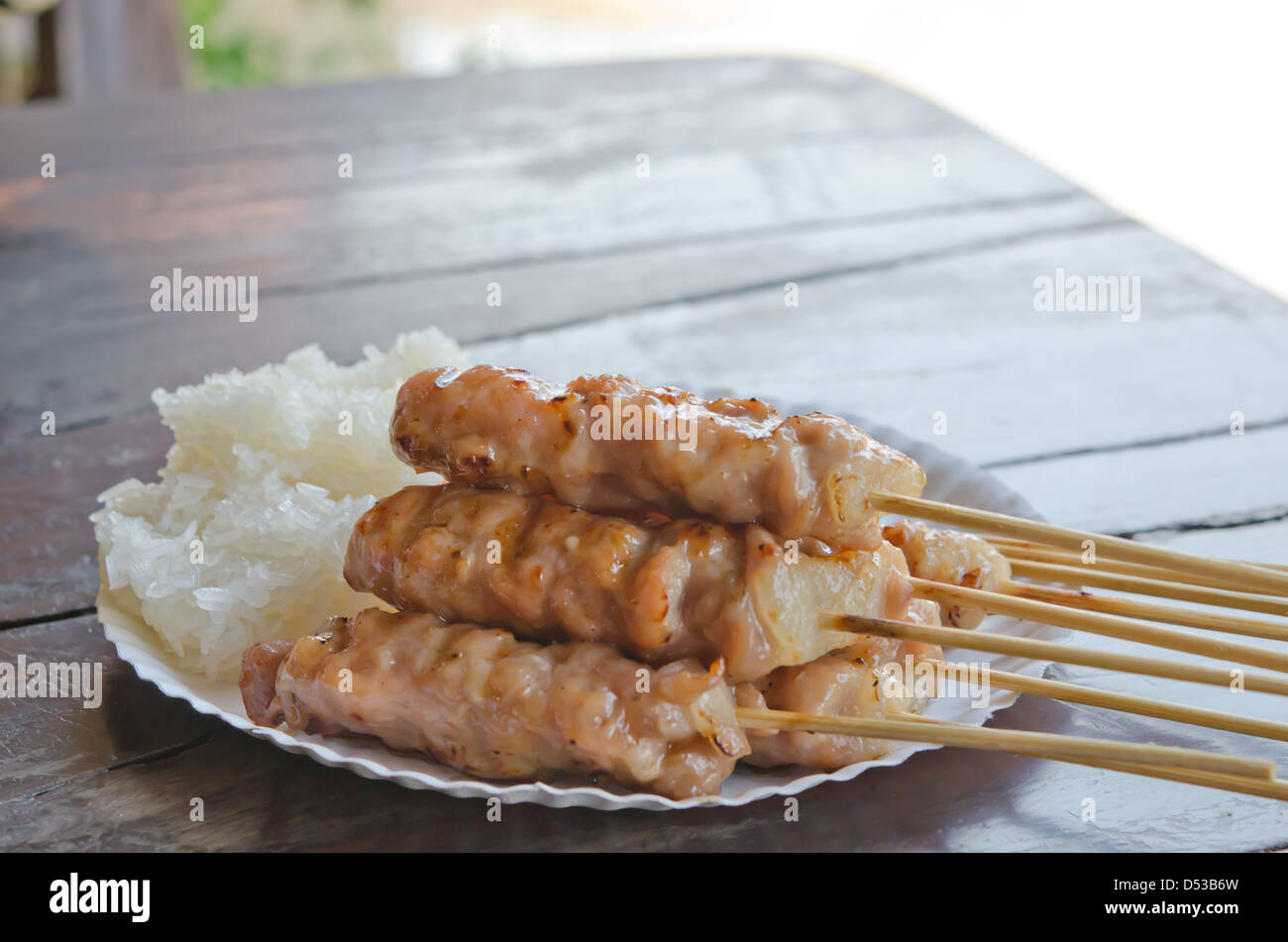 grilled pork with sweet sauce served with sticky rice Stock Photo - Alamy
