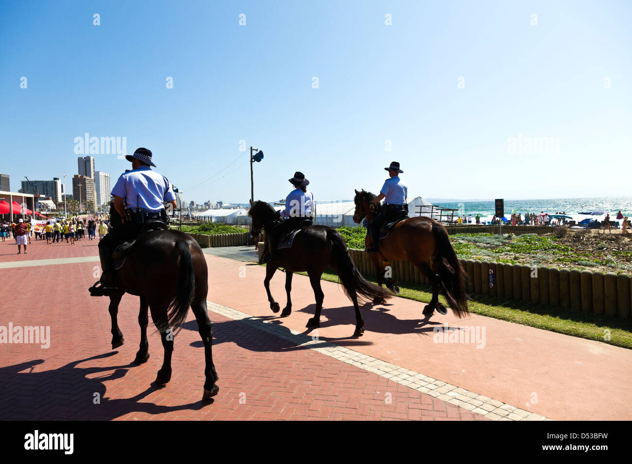 Horseback Metro` police officers on patrol along Durban's beachfront ...