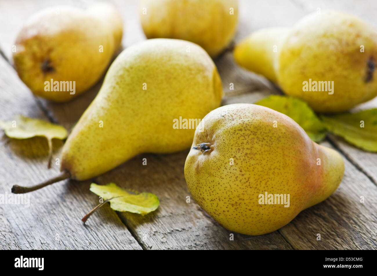 pears on wood table closeup Stock Photo - Alamy