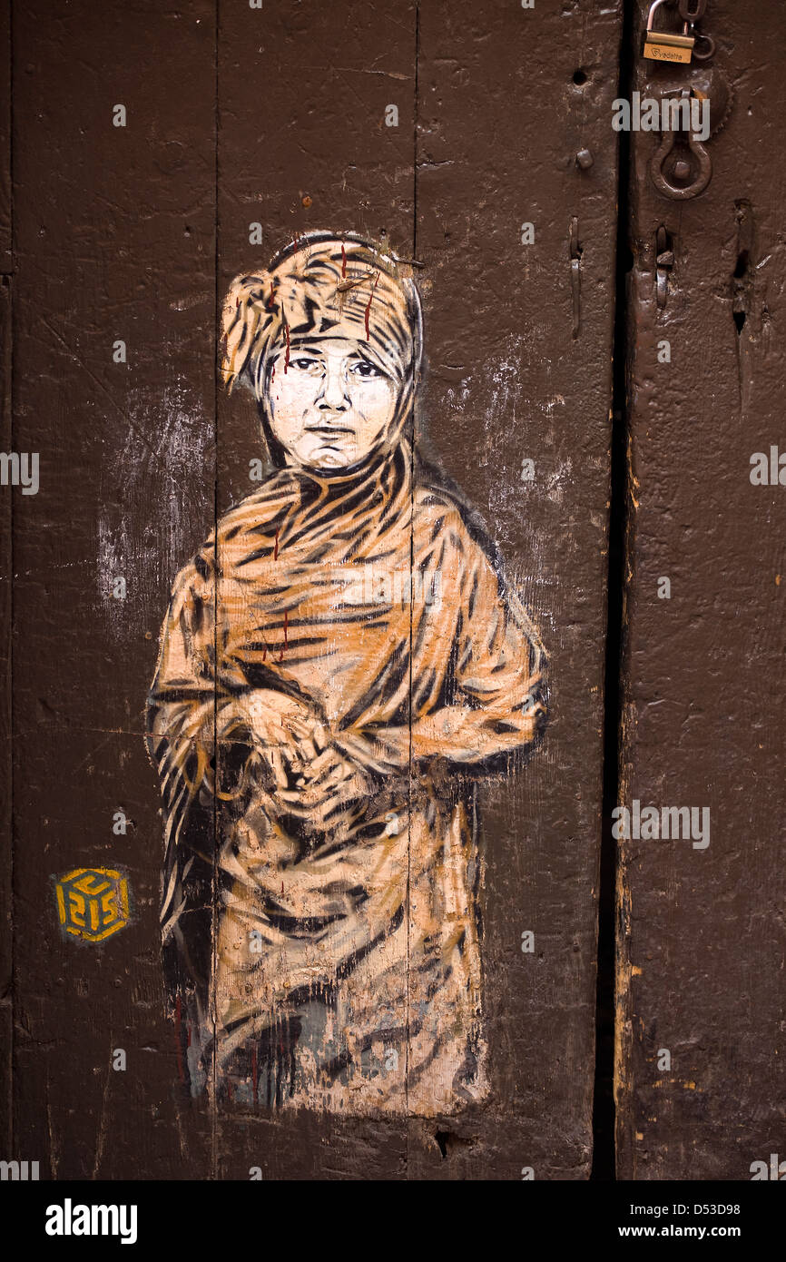 Banksy on a Marrakech Doorway, Morocco Stock Photo - Alamy