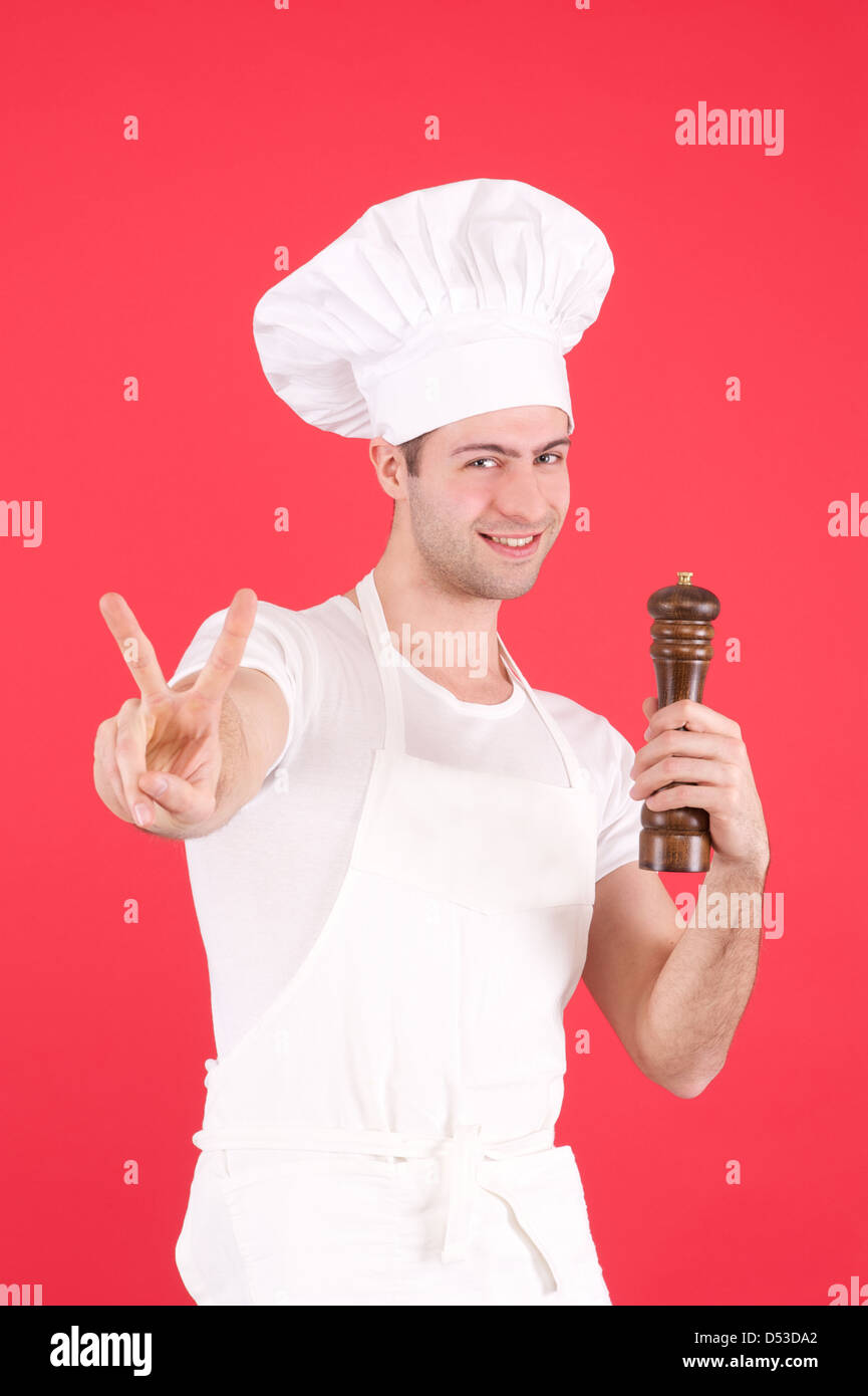 chef shot in red background Stock Photo - Alamy