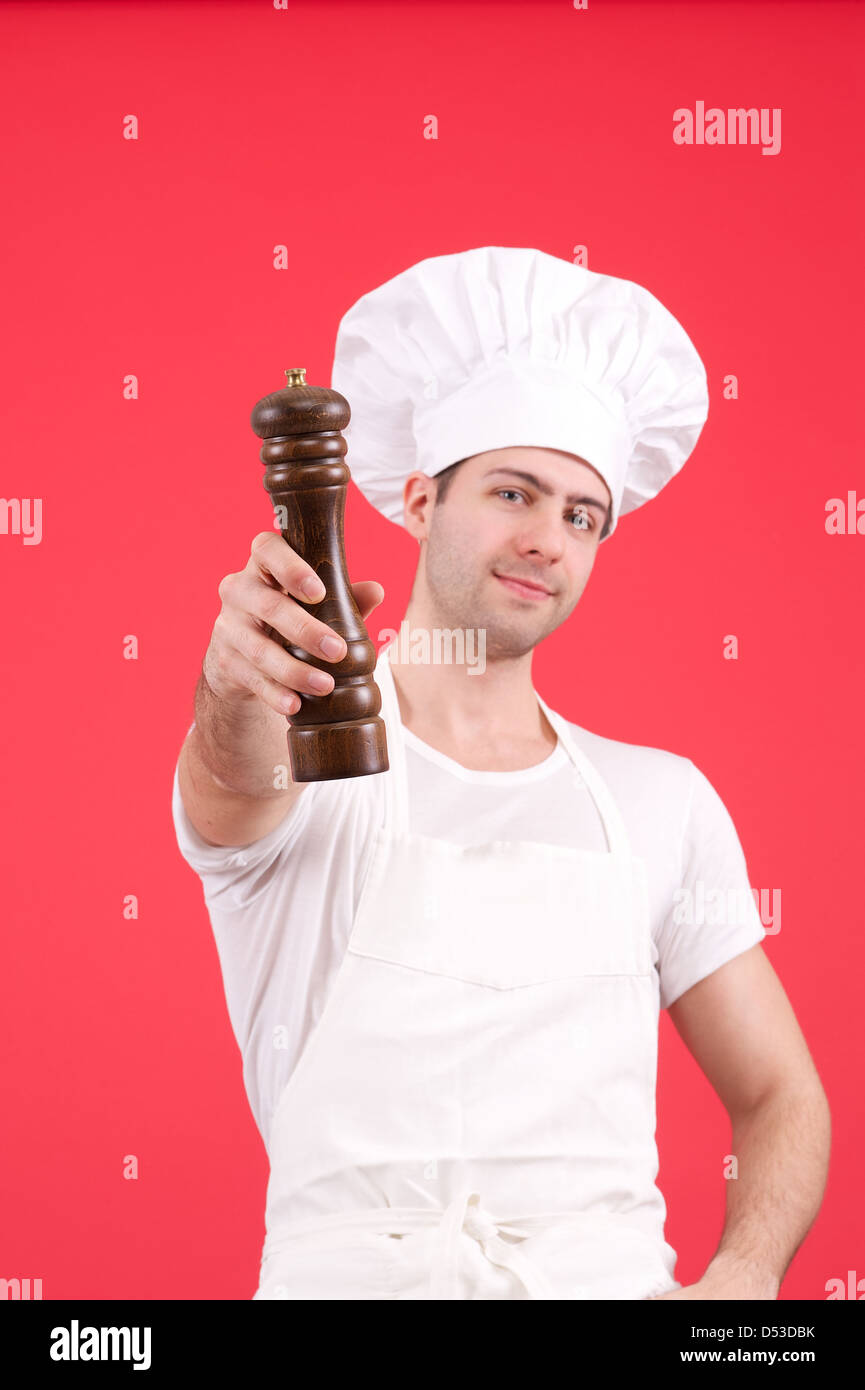 chef shot in red background Stock Photo - Alamy