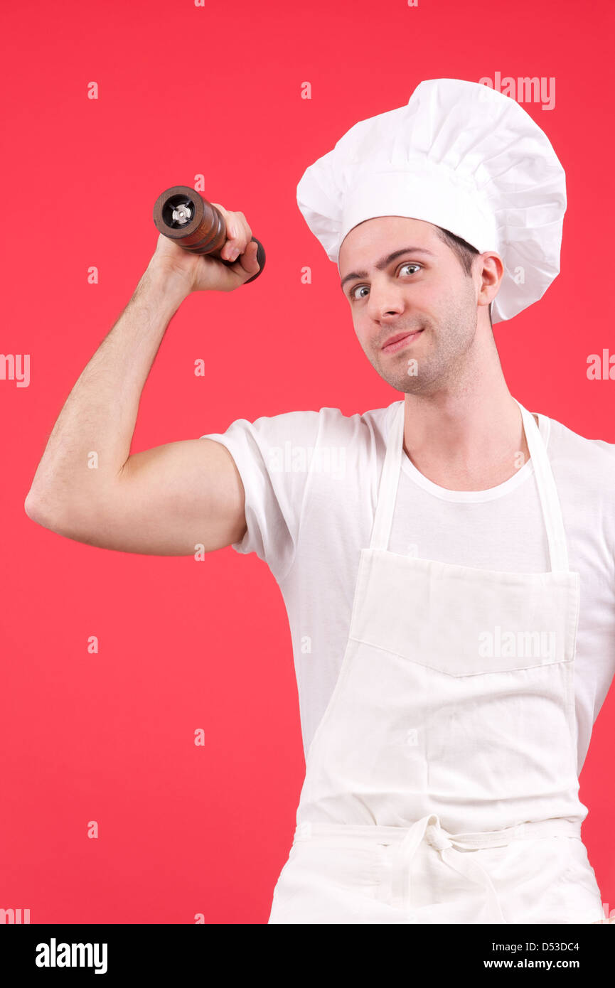chef shot in red background Stock Photo - Alamy