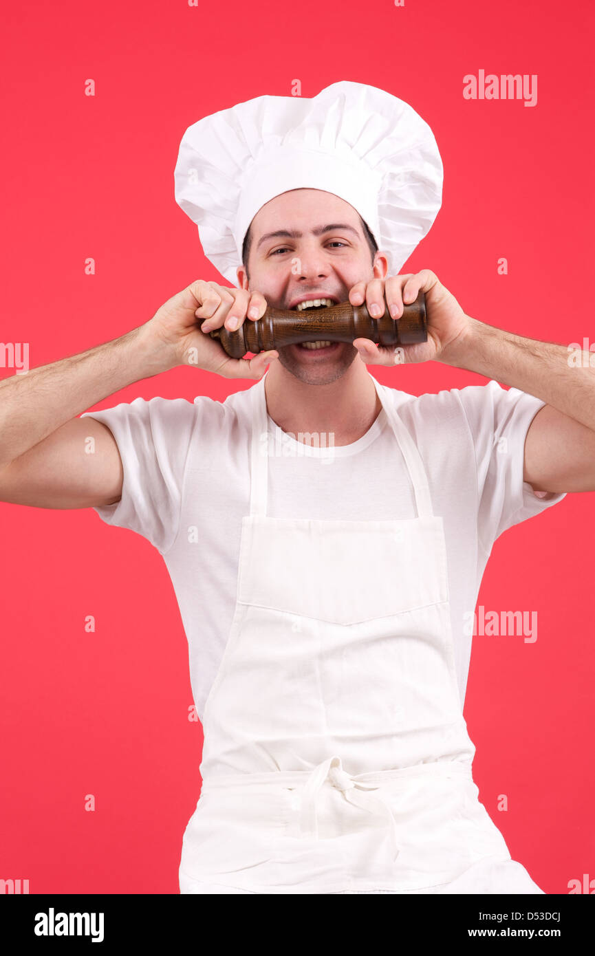 chef shot in red background Stock Photo - Alamy