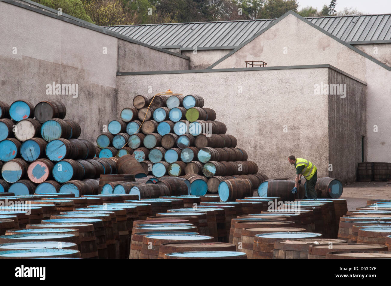 Whisky distillery exteriors with barrel Stock Photo - Alamy