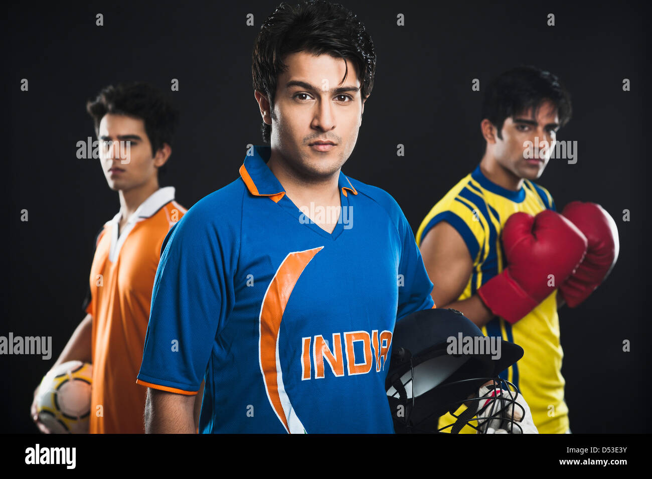 Portrait of three different sportsmen Stock Photo - Alamy