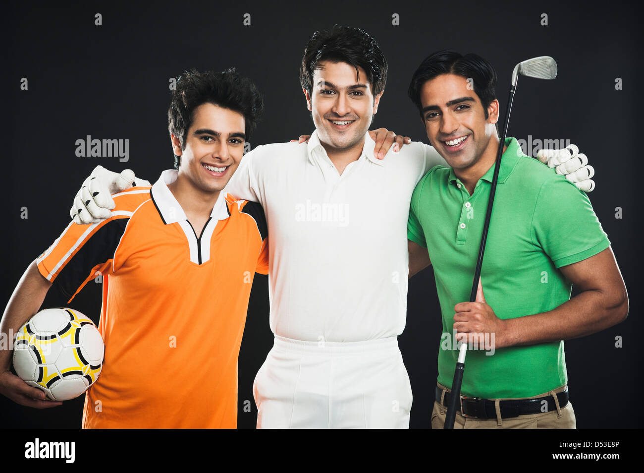 Portrait of three different sportsmen smiling Stock Photo - Alamy