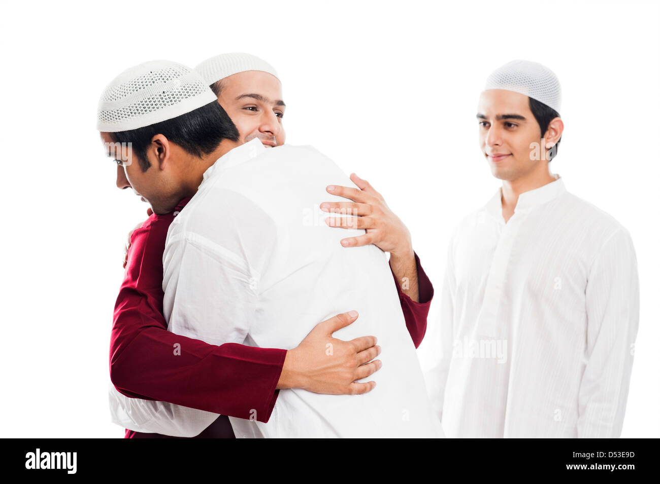 Friends embracing each other during Eid festival Stock Photo - Alamy