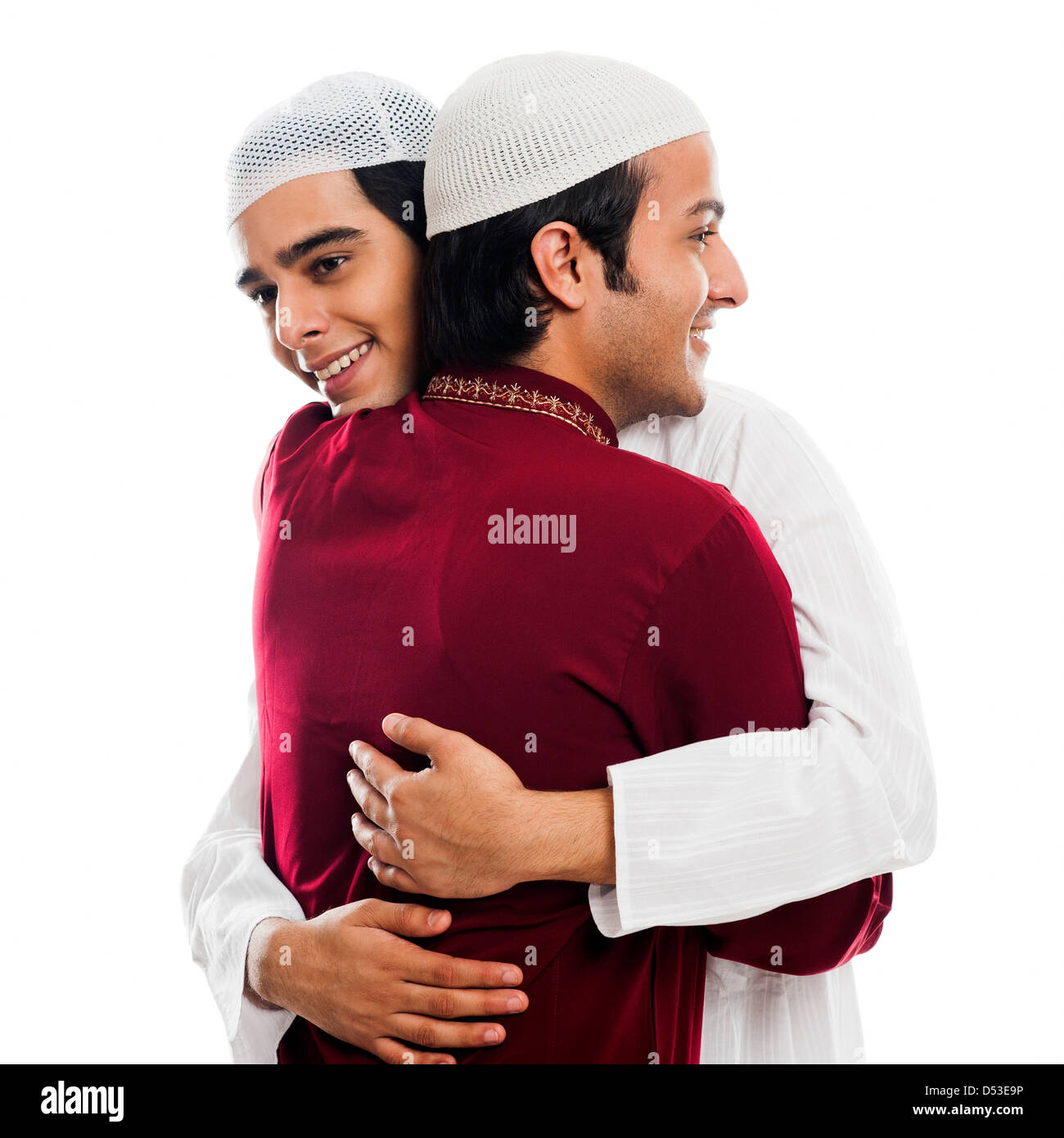 Muslim men hugging each other hi-res stock photography and images - Alamy