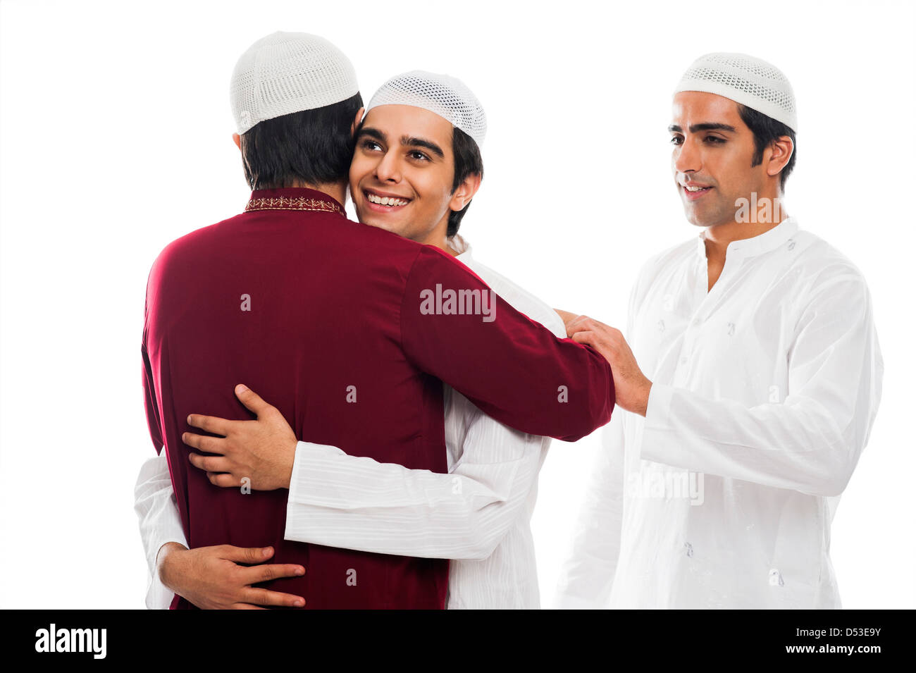 Friends embracing each other during Eid festival Stock Photo - Alamy