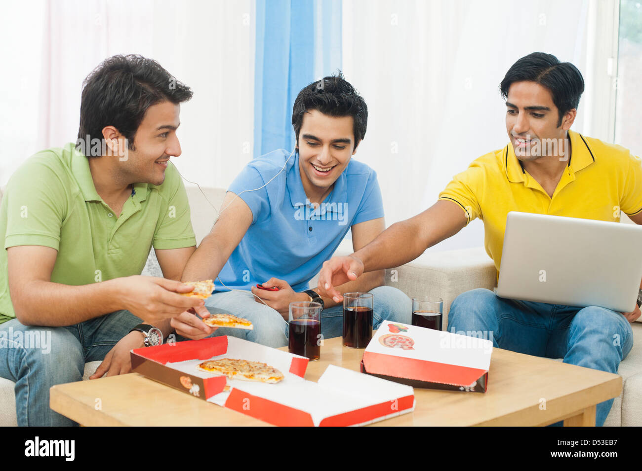 Sharing a laptop computer hi-res stock photography and images - Alamy