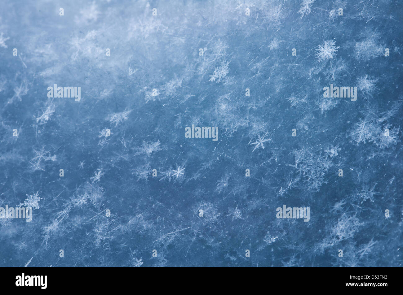 Blue snowflakes background hi-res stock photography and images - Alamy