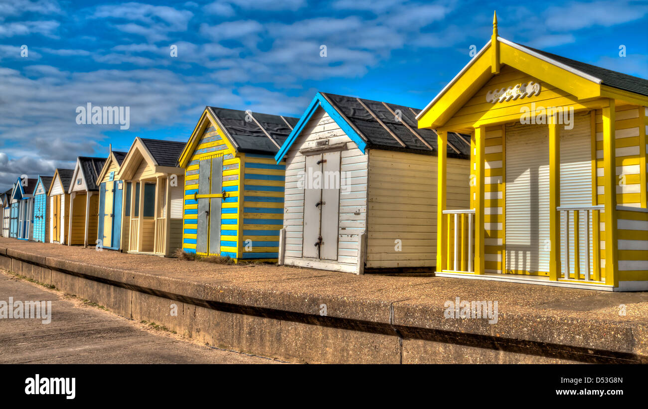 bright coloured beach huts at the seaside Stock Photo - Alamy