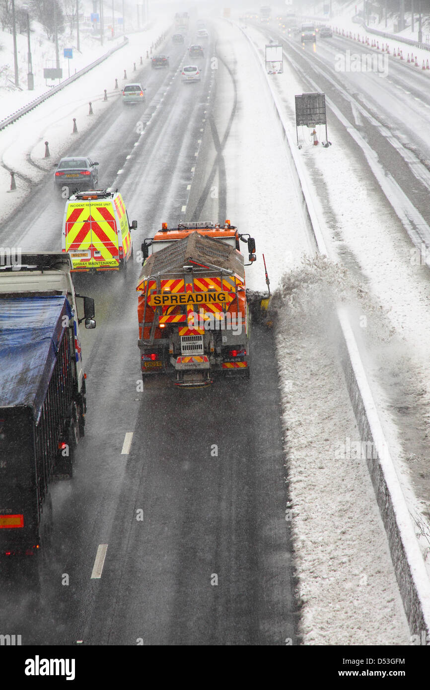 Snow plough reopens the third lane of the M62 near Junction27 Stock ...