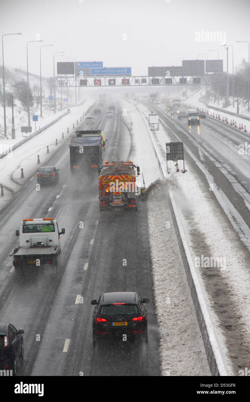 Snow plough reopens the third lane of the M62 near Junction27 Stock ...