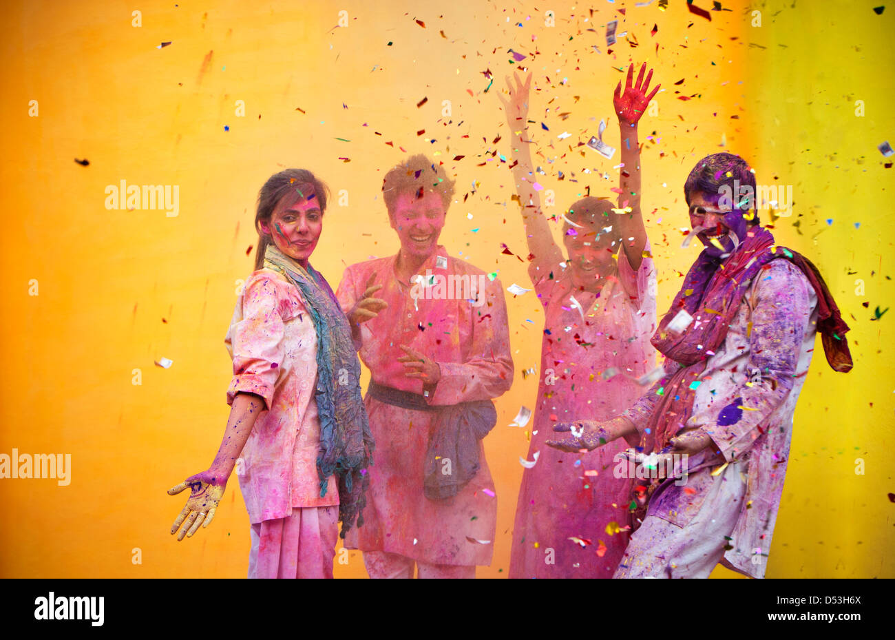 Friends celebrating Holi Stock Photo - Alamy
