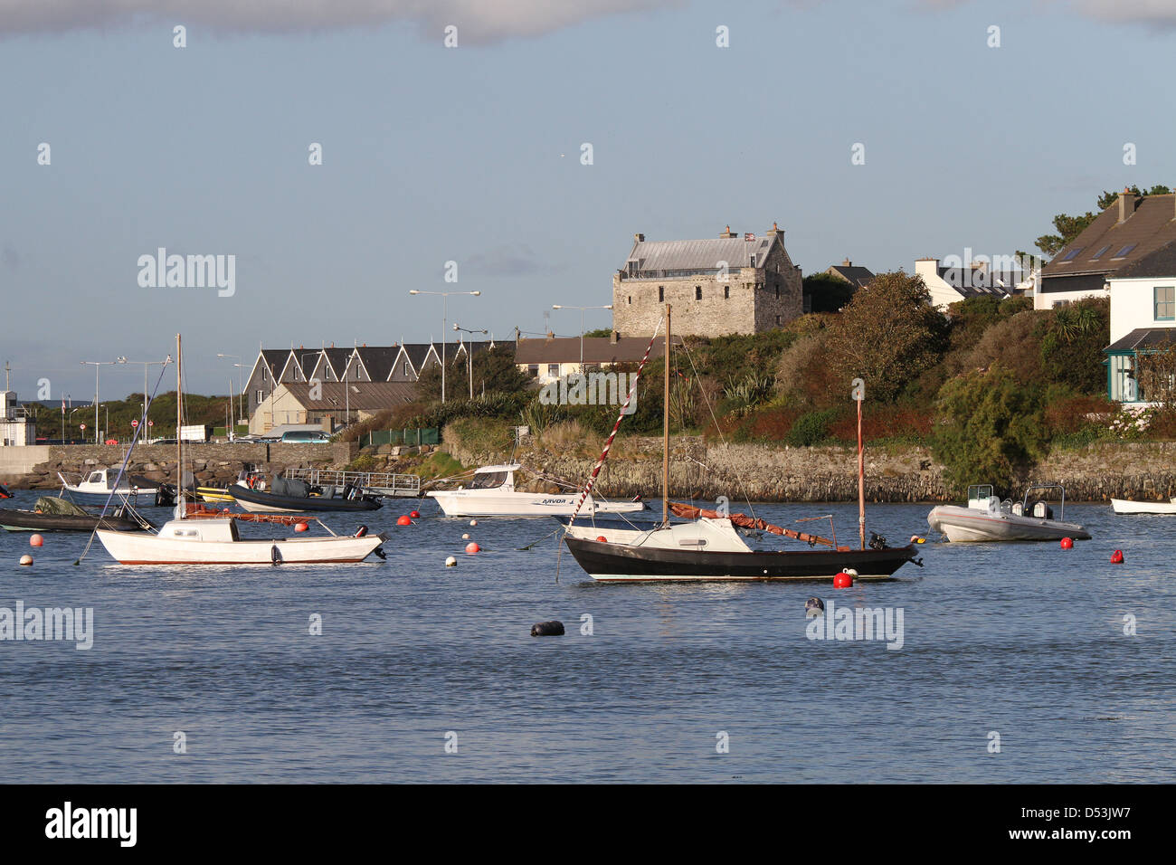 Boats moored in Baltimore County Cork Ireland with Baltimore Castle in ...