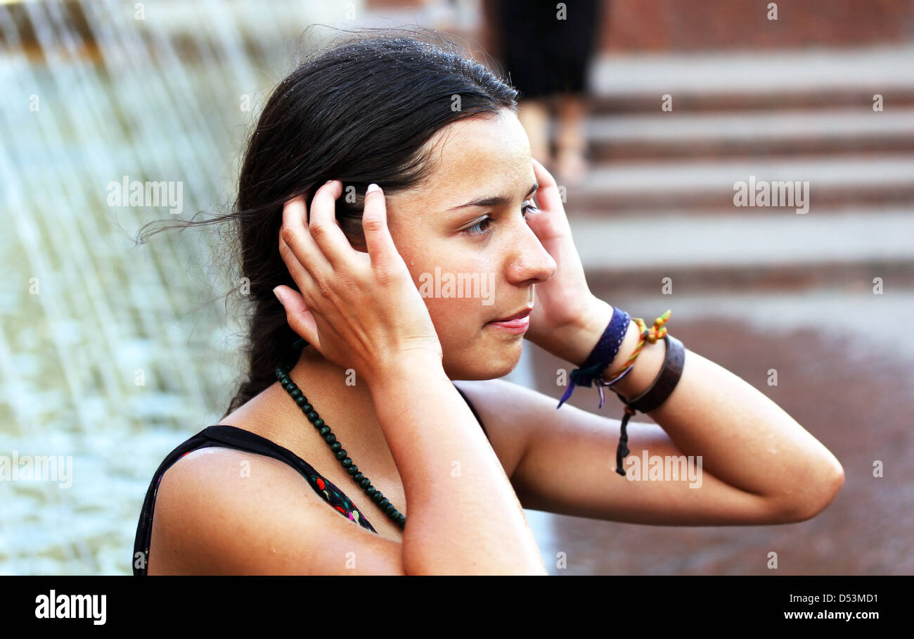 Cheerful wet teen girl hi-res stock photography and images - Alamy