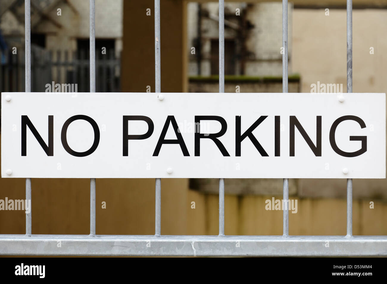 No Parking sign on a gate, UK Stock Photo - Alamy