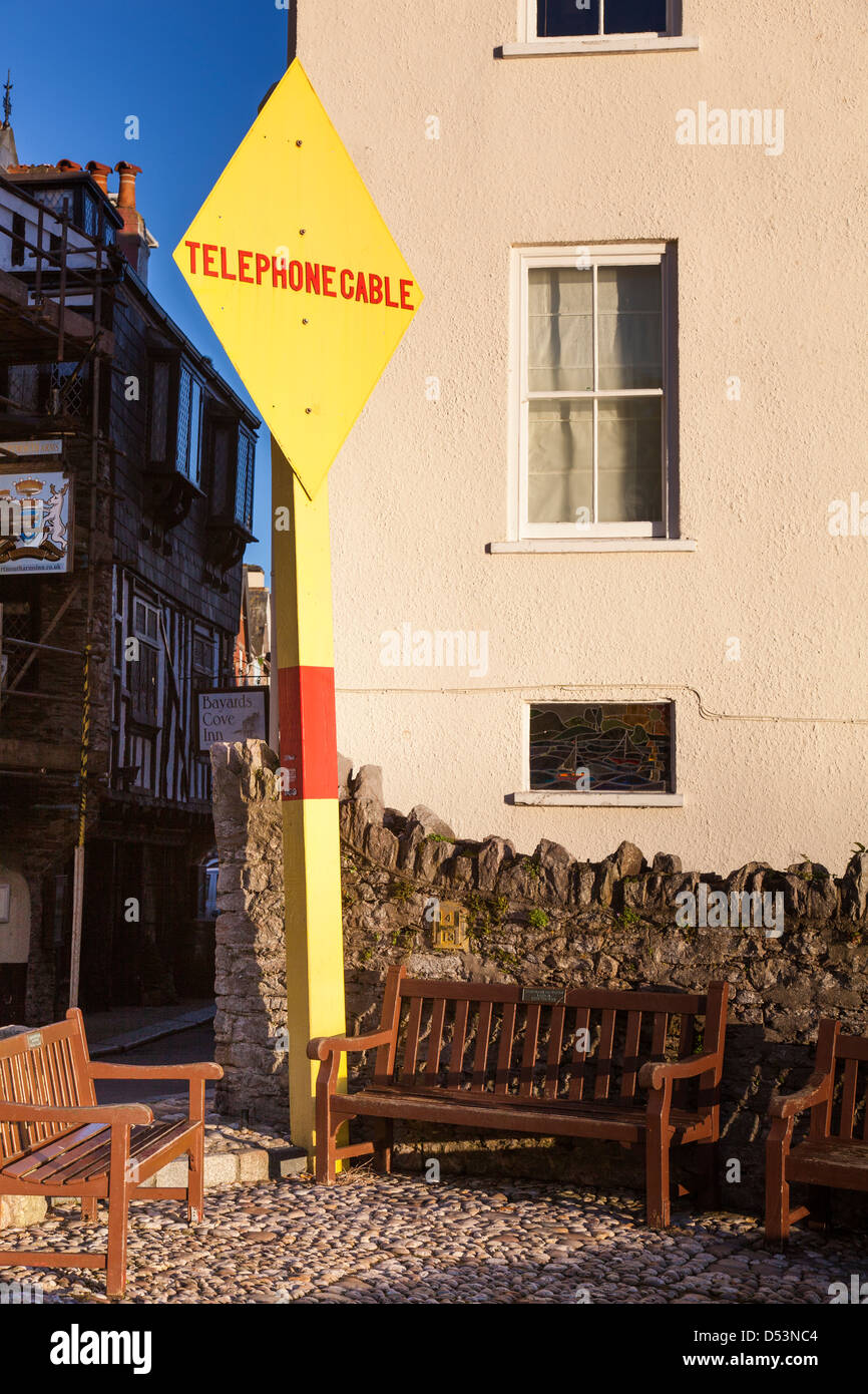 Large yellow diamond shaped sign on a high post identifies the location ...