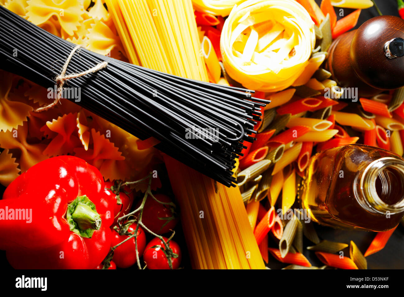 Pasta ingredients on black table, italian cuisine concept Stock Photo ...