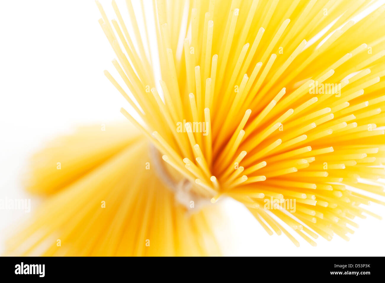 Dry spaghetti isolated on white background Stock Photo - Alamy