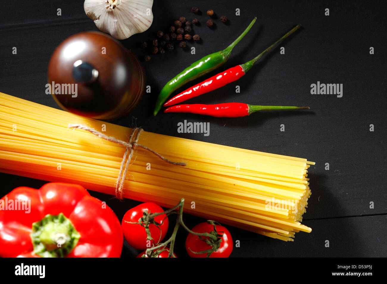 Pasta ingredients on black table, italian cuisine concept Stock Photo ...