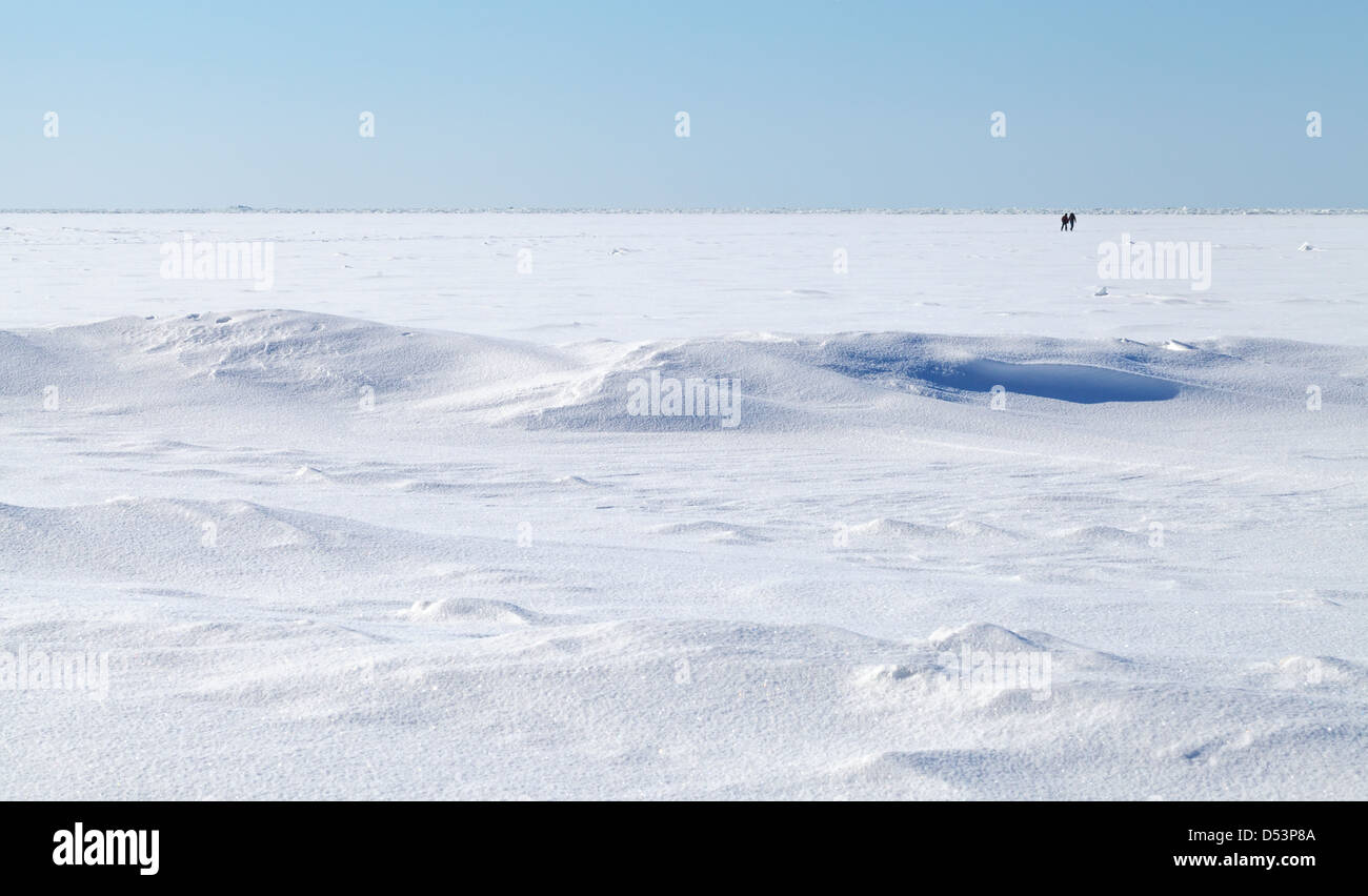 Winter landscape. Deep blue sky and snow on frozen Baltic Sea with ...