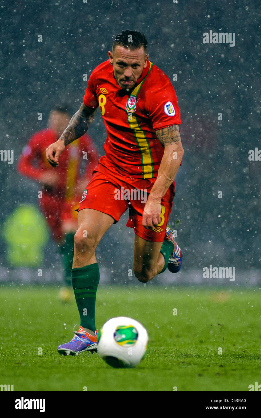 Craig Bellamy in action during the World Cup Group A game at Hampden ...