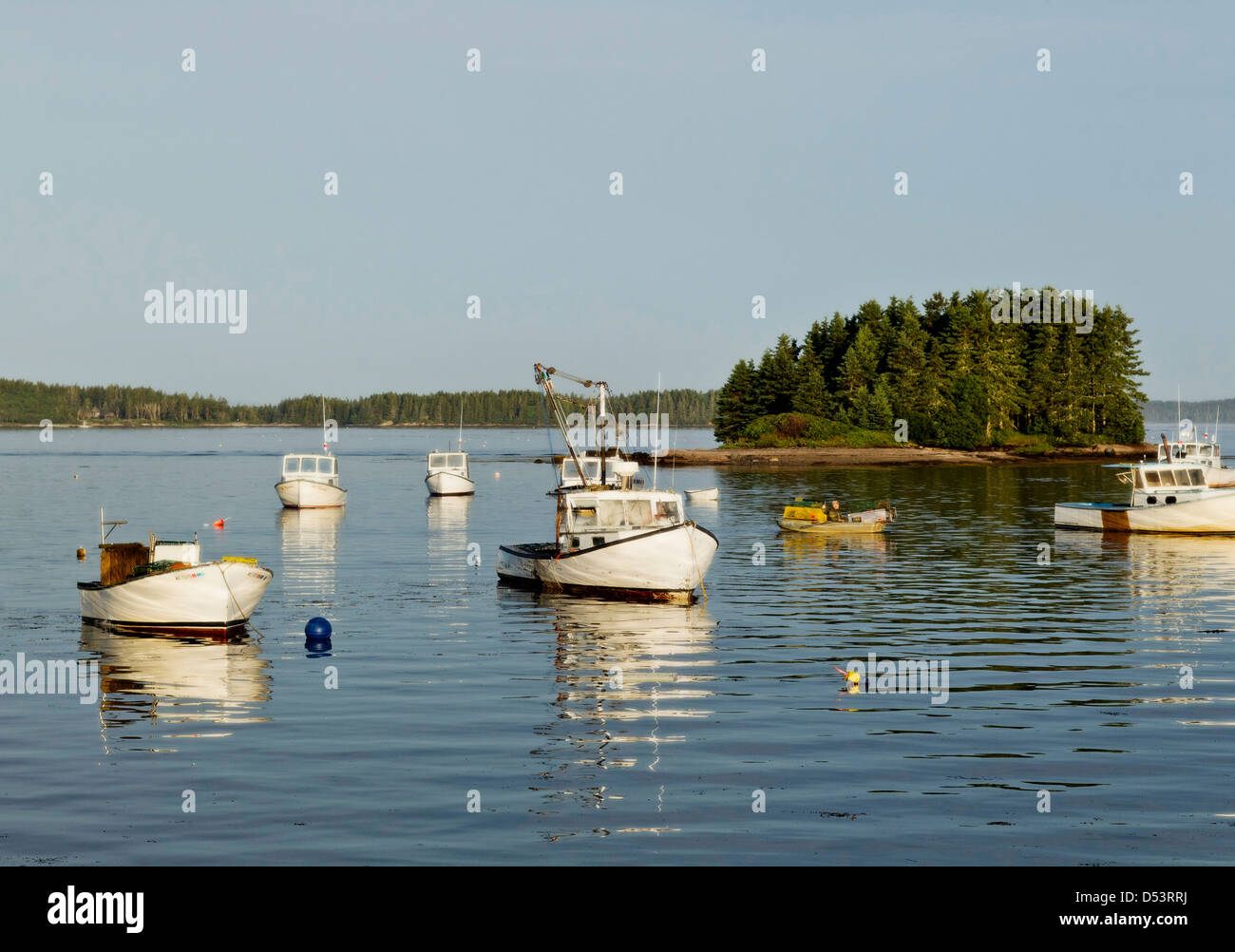 A man rows to his lobster boat in Beals Island, Maine Stock Photo - Alamy