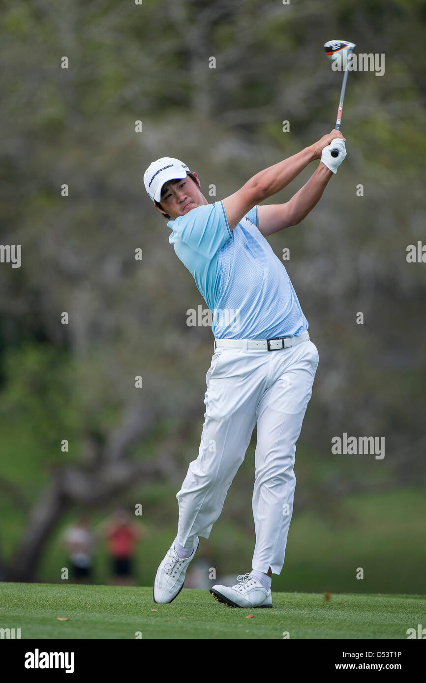 Orlando, Florida. 23rd March, 2013. John Huh hits from the 16th tee ...