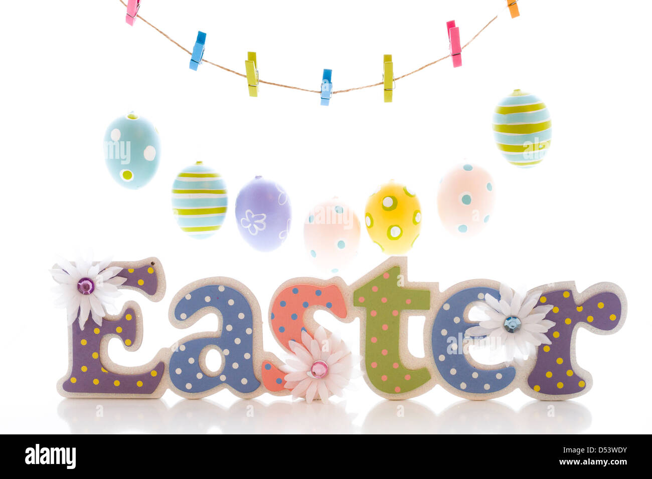 Easter sign with hand painted eggs Stock Photo - Alamy