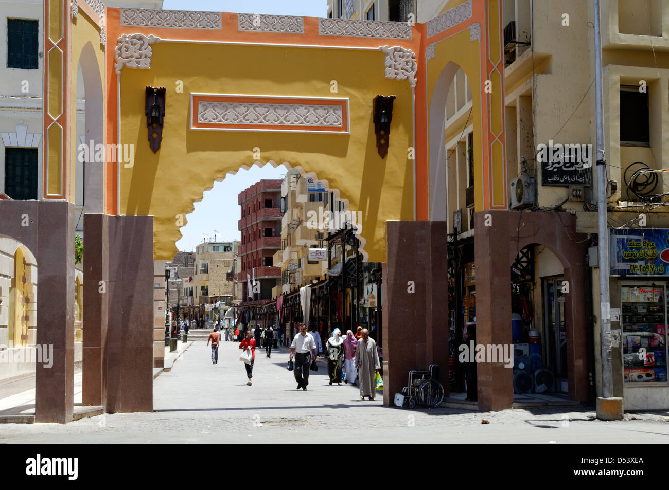 An arched entrance to the souk or market of Aswan. Egypt Stock Photo ...
