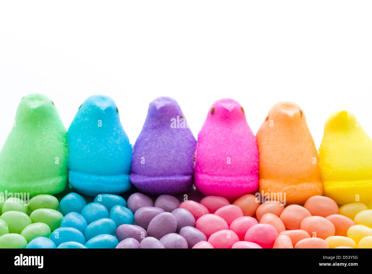 Rainbow color marshmallow peeps and jelly beans Stock Photo - Alamy