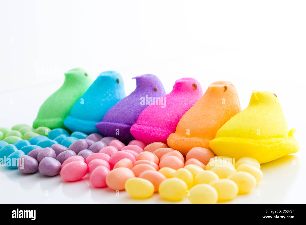Rainbow color marshmallow peeps and jelly beans Stock Photo - Alamy