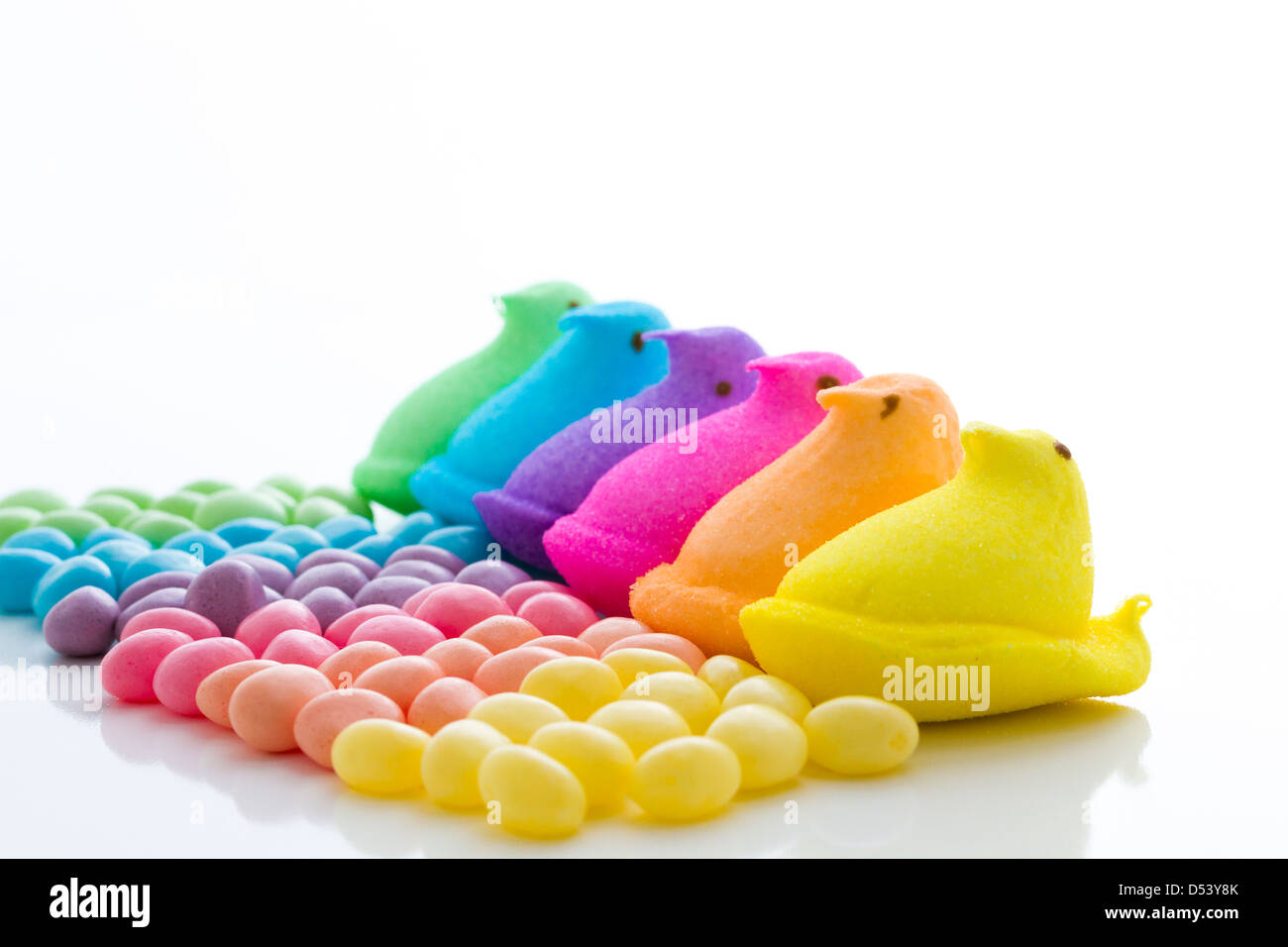 Rainbow color marshmallow peeps and jelly beans Stock Photo - Alamy