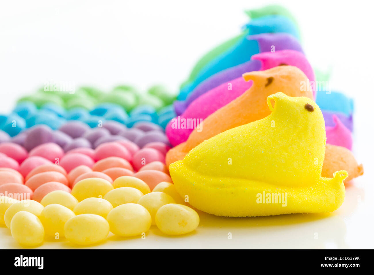 Rainbow color marshmallow peeps and jelly beans Stock Photo - Alamy