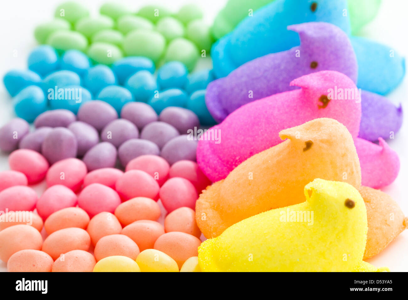 Rainbow color marshmallow peeps and jelly beans Stock Photo - Alamy