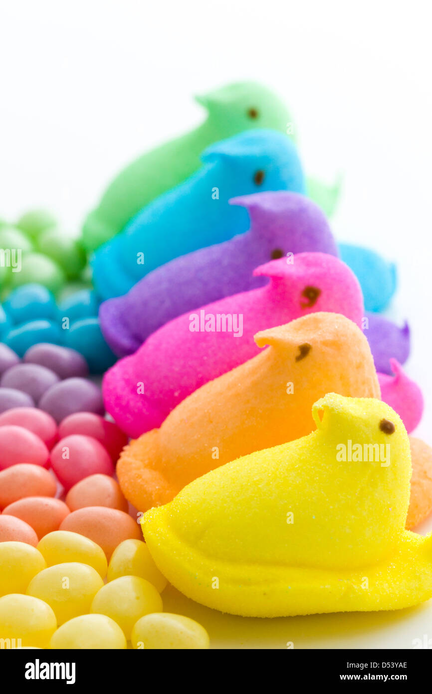 Rainbow color marshmallow peeps and jelly beans Stock Photo - Alamy