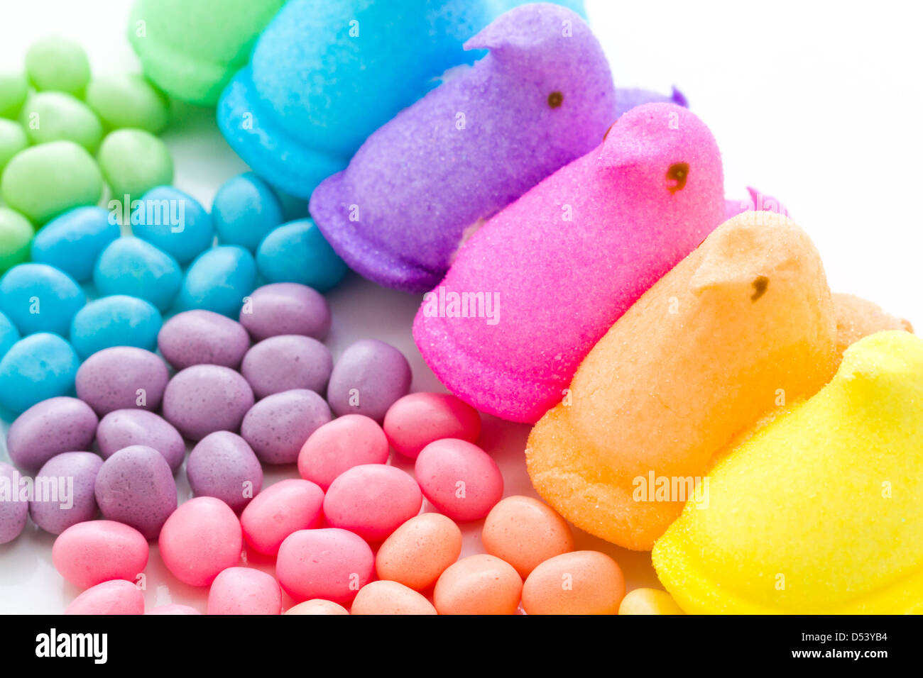 Rainbow color marshmallow peeps and jelly beans Stock Photo - Alamy