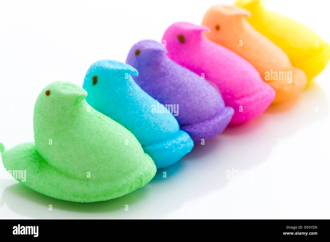 Rainbow color marshmallow peeps and jelly beans Stock Photo - Alamy